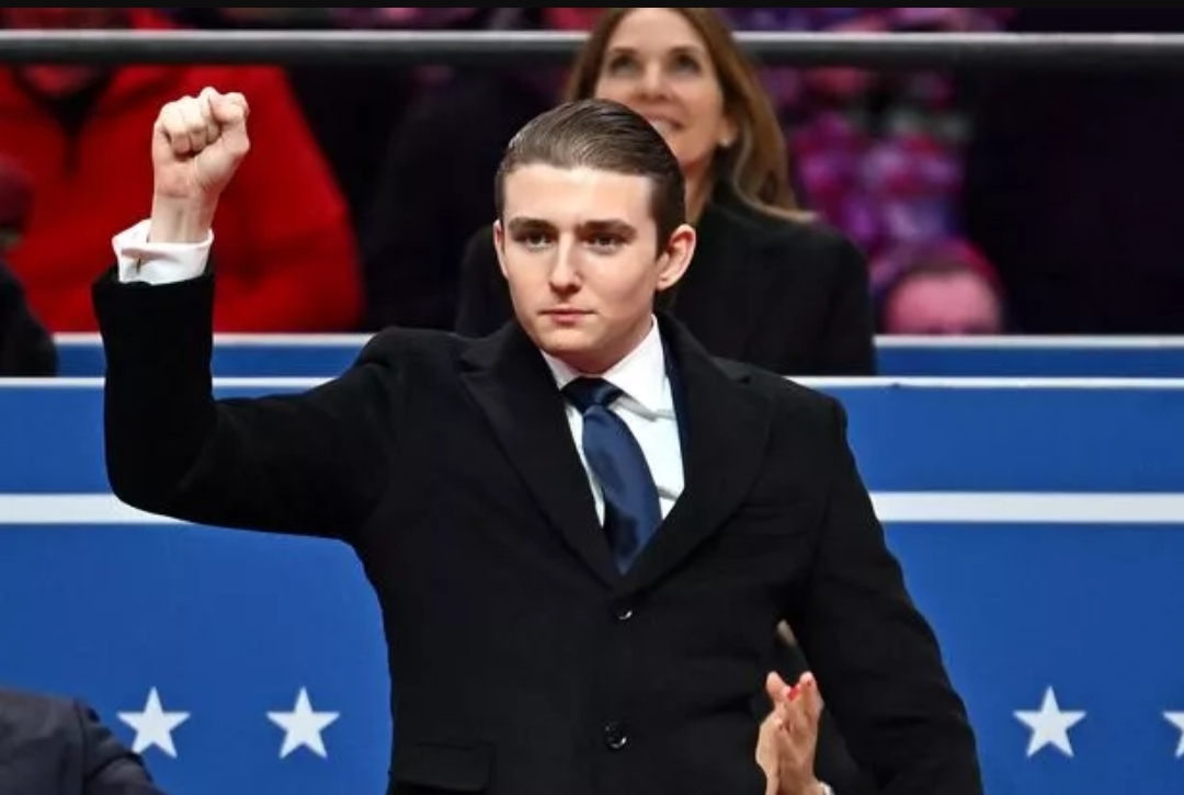 Hidden meaning behind Barron Trump’s bizarre hand movements spotted at ...