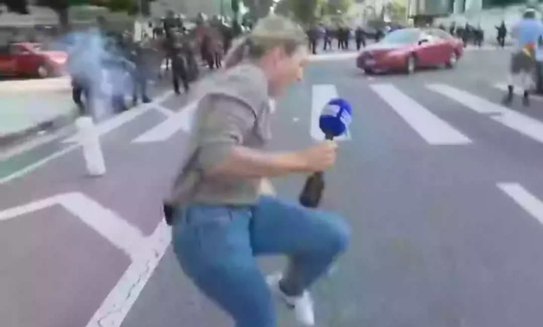 Shocking moment reporter is shot by police whilst filming during ...